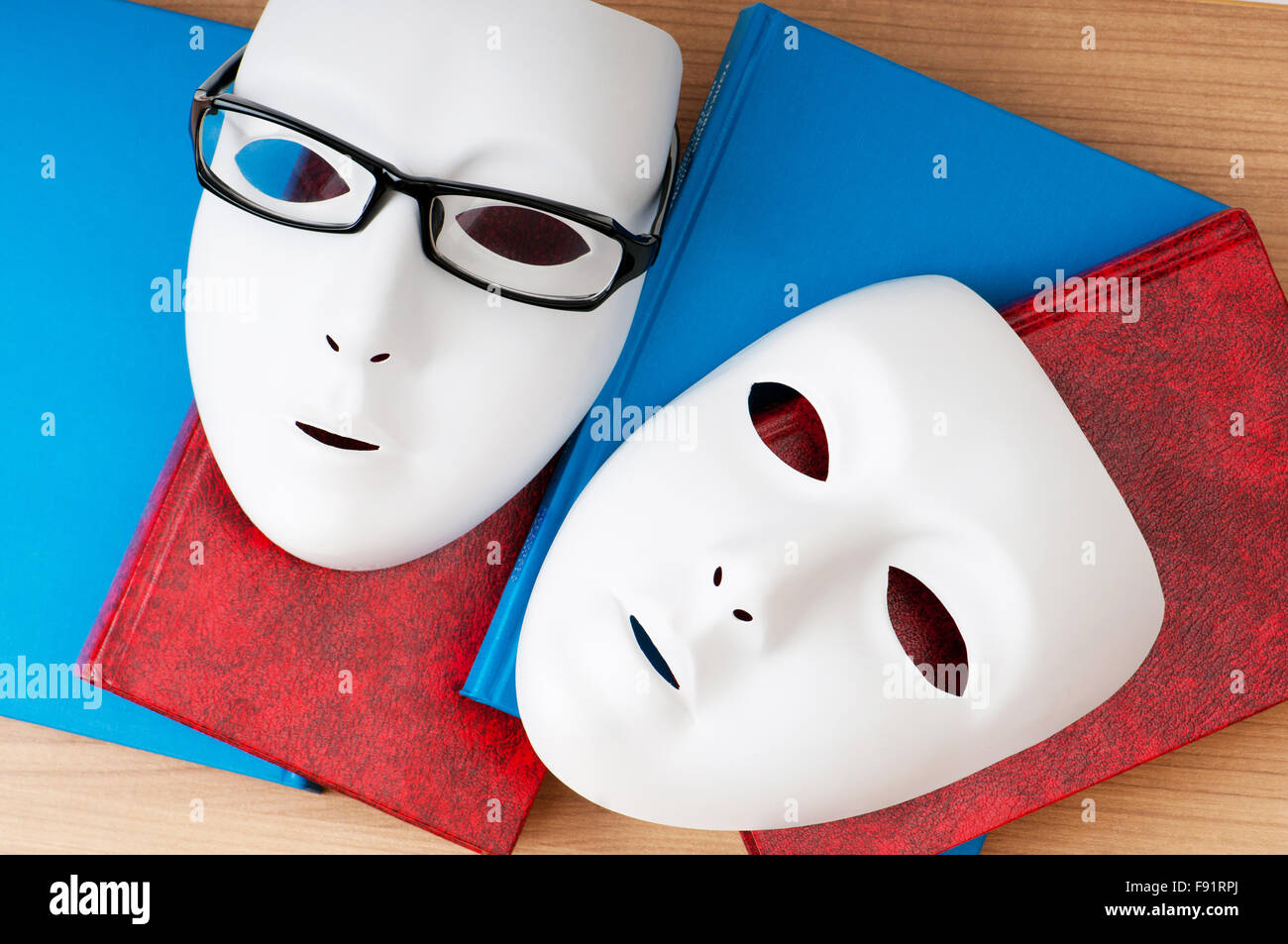 Reading concept with masks, books and glasses Stock Photo - Alamy