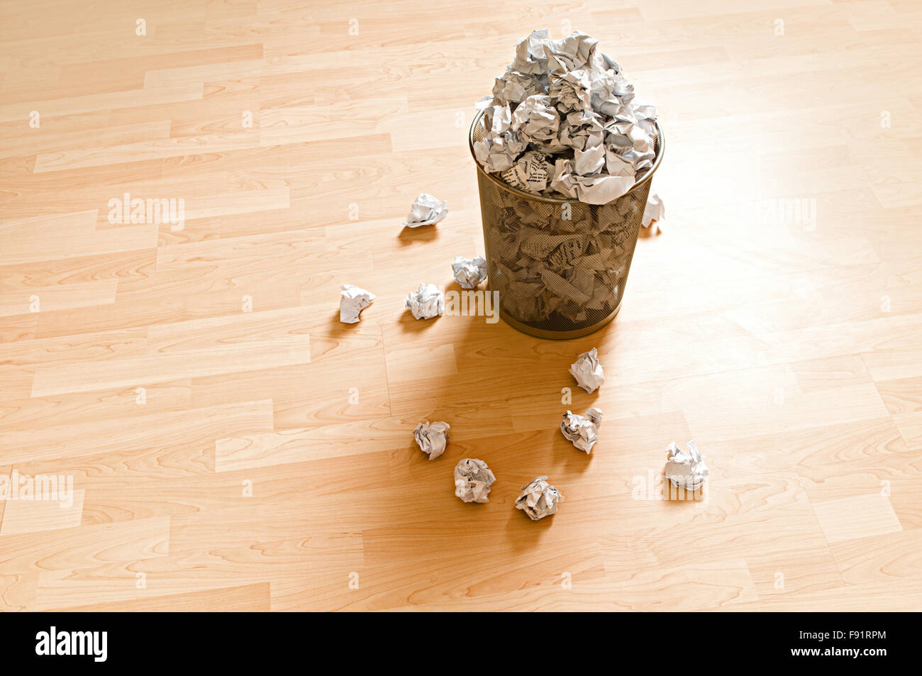 Garbage bin with paper waste isolated on white Stock Photo - Alamy