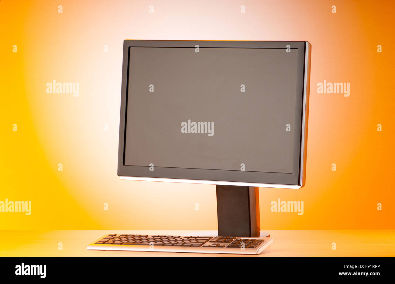 Wide screen computer monitor against colorful background Stock Photo ...