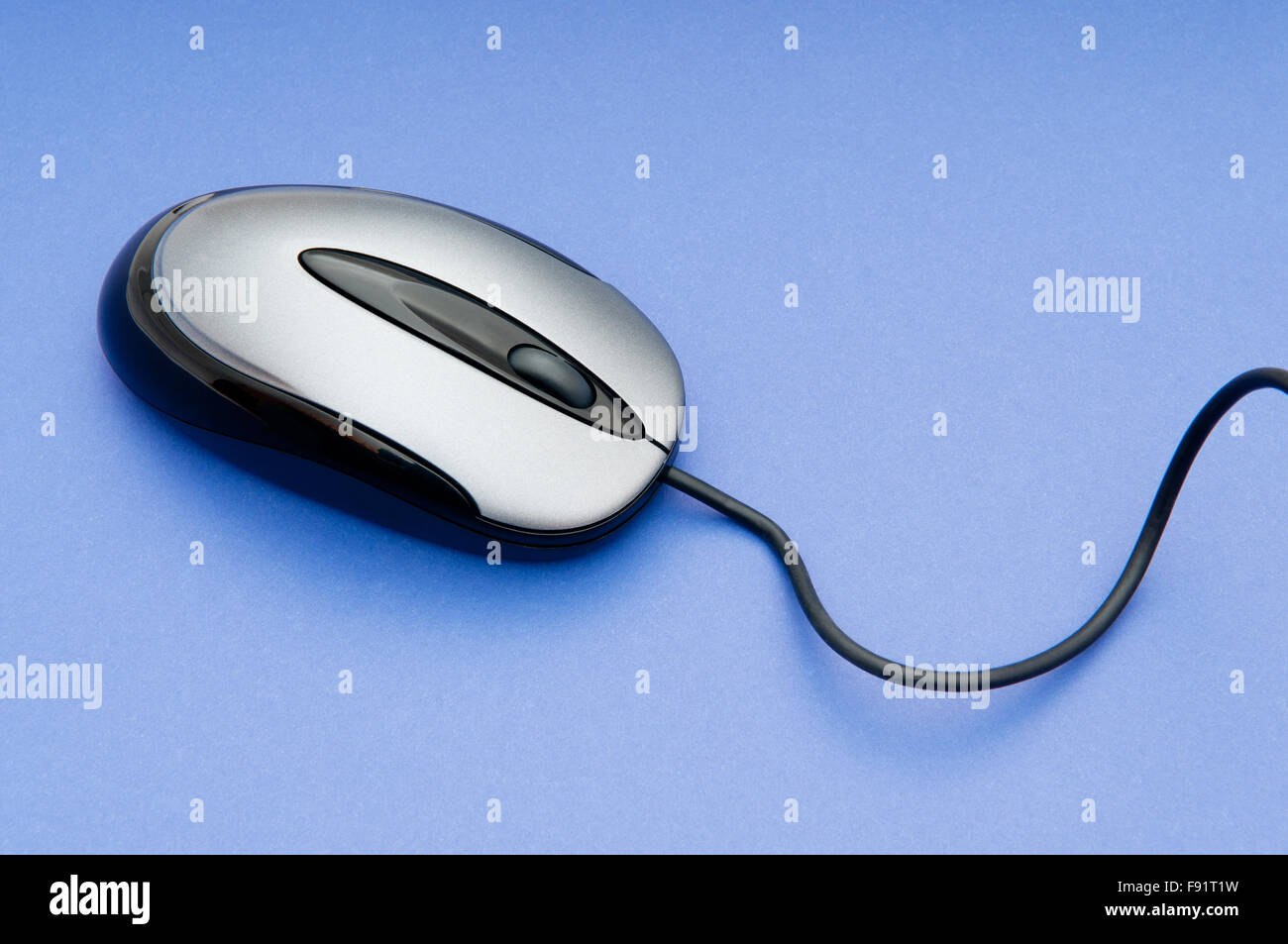Computer mouse on the background - Technology concept Stock Photo - Alamy