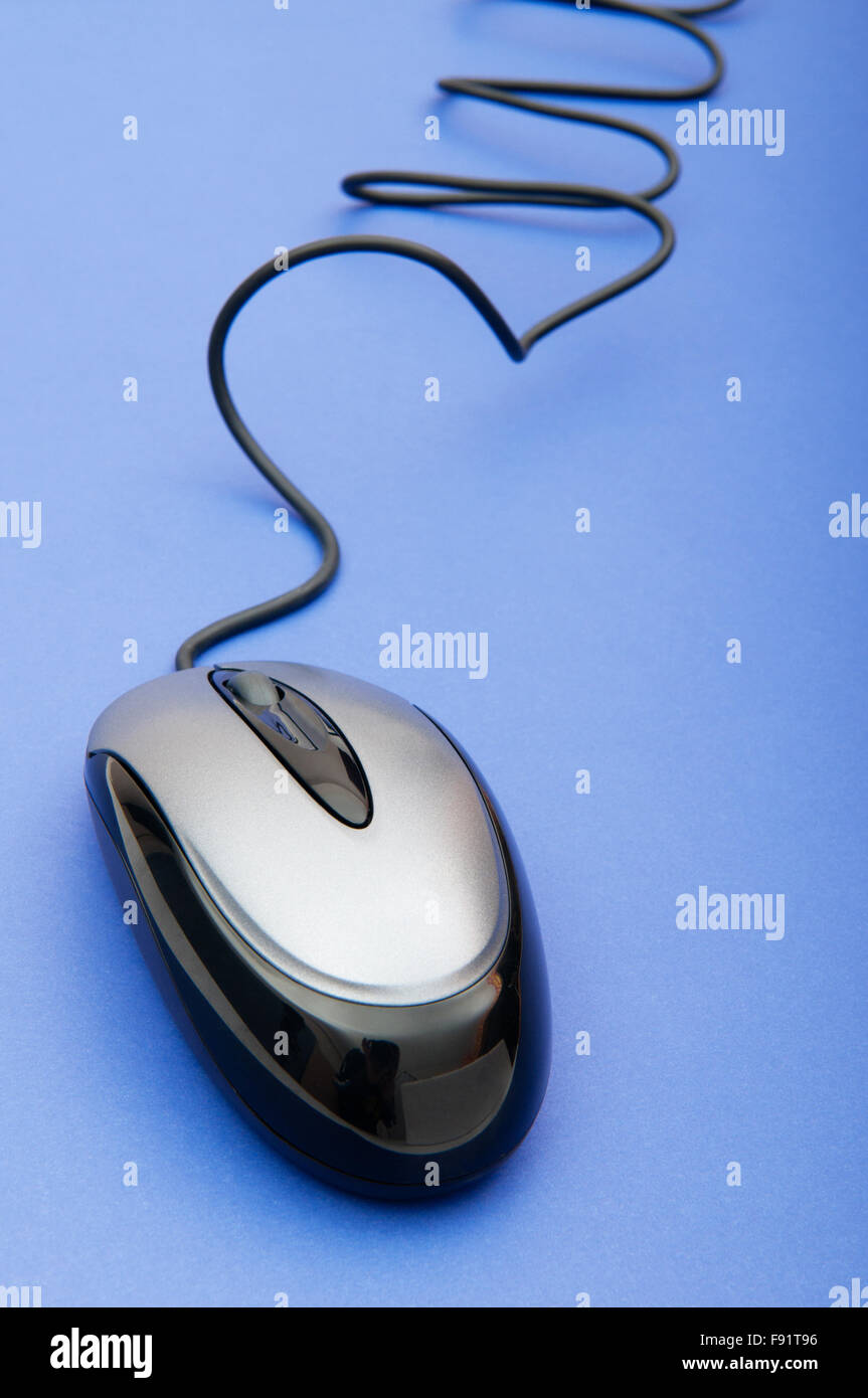 Computer mouse on the background - Technology concept Stock Photo - Alamy