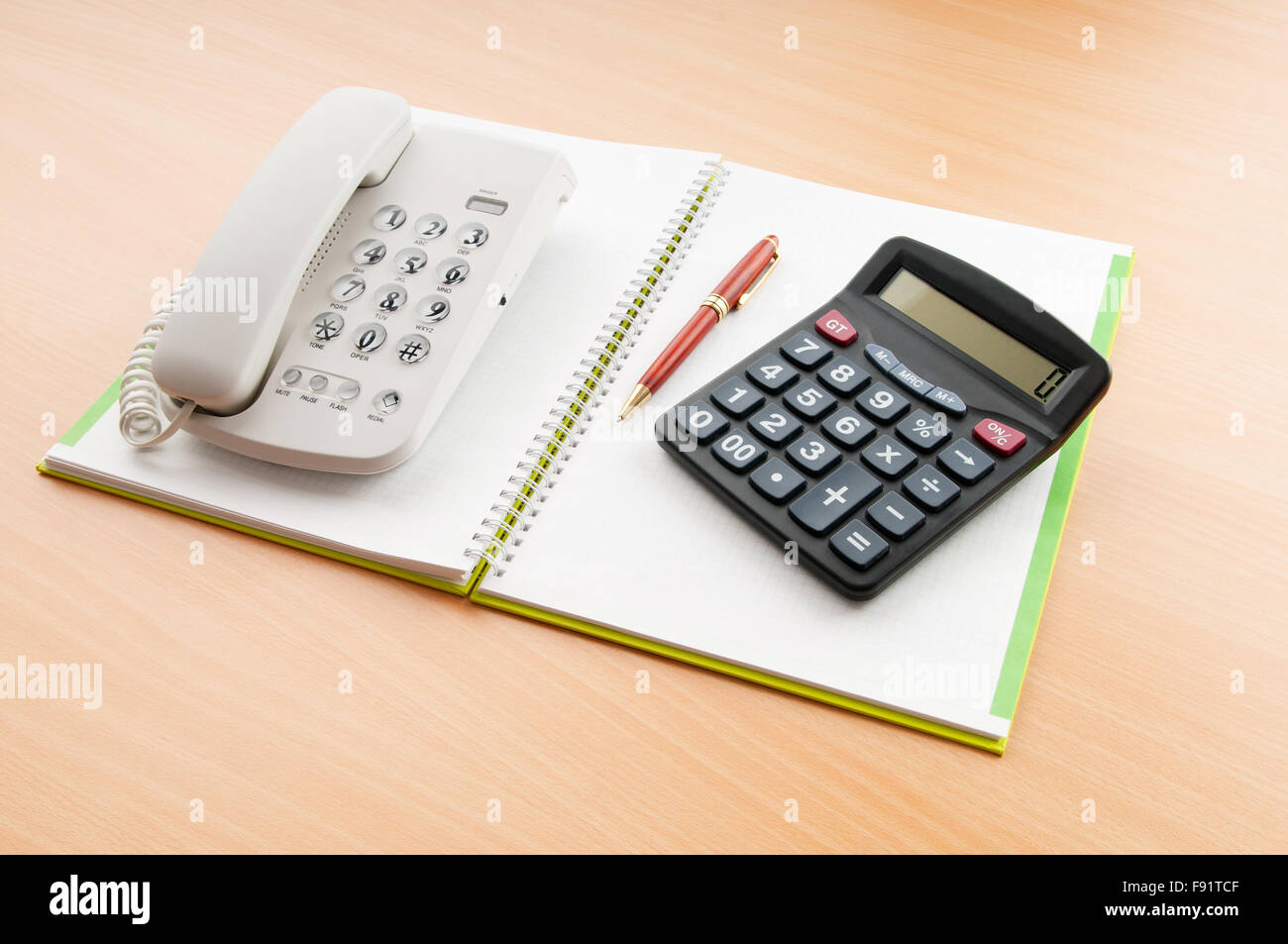 Business concept with notepad and calculator Stock Photo - Alamy