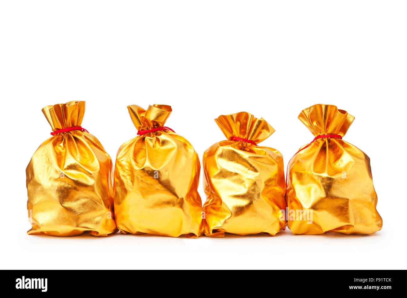 Golden sacks full of something good Stock Photo - Alamy