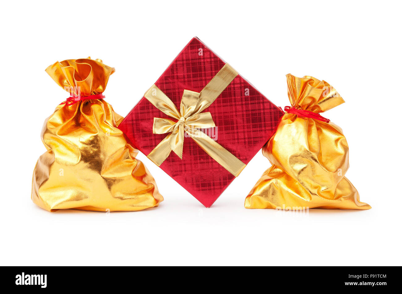 Gift boxes and golden sacks Stock Photo - Alamy