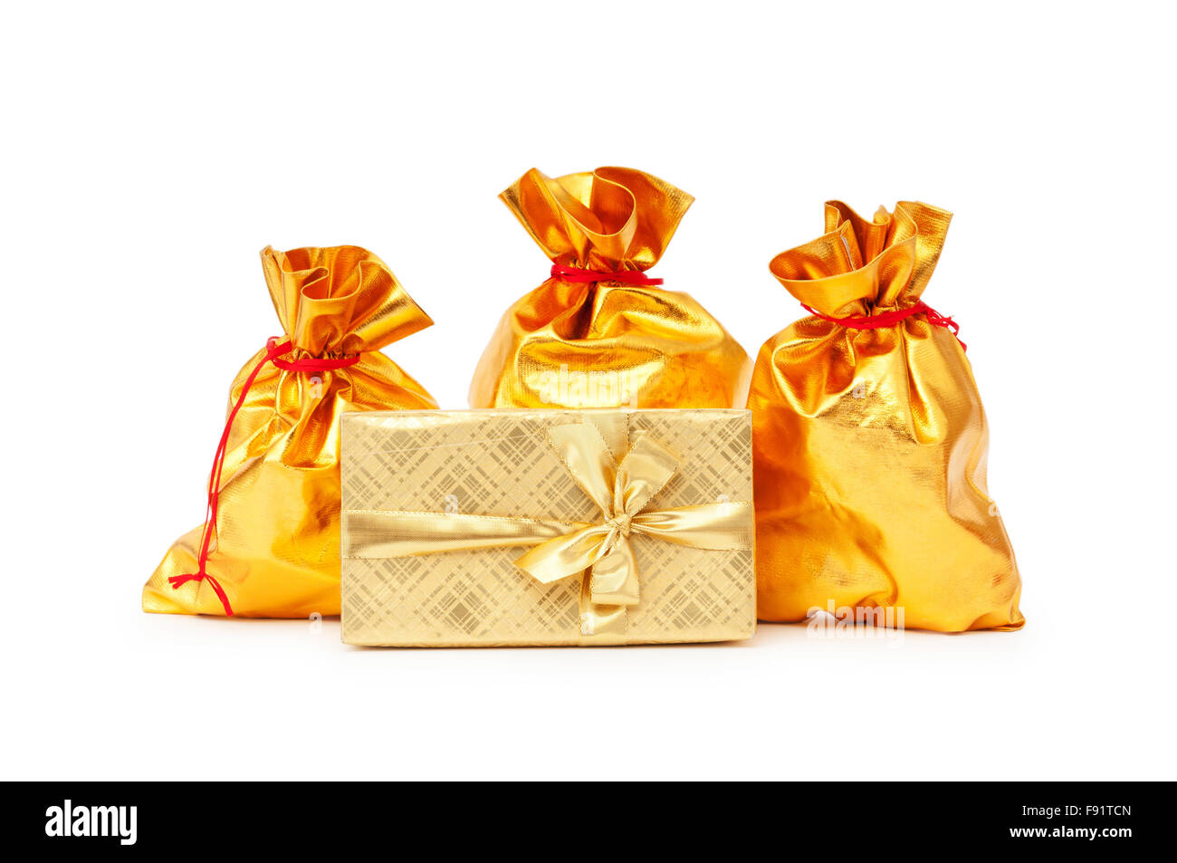 Gift boxes and golden sacks Stock Photo - Alamy