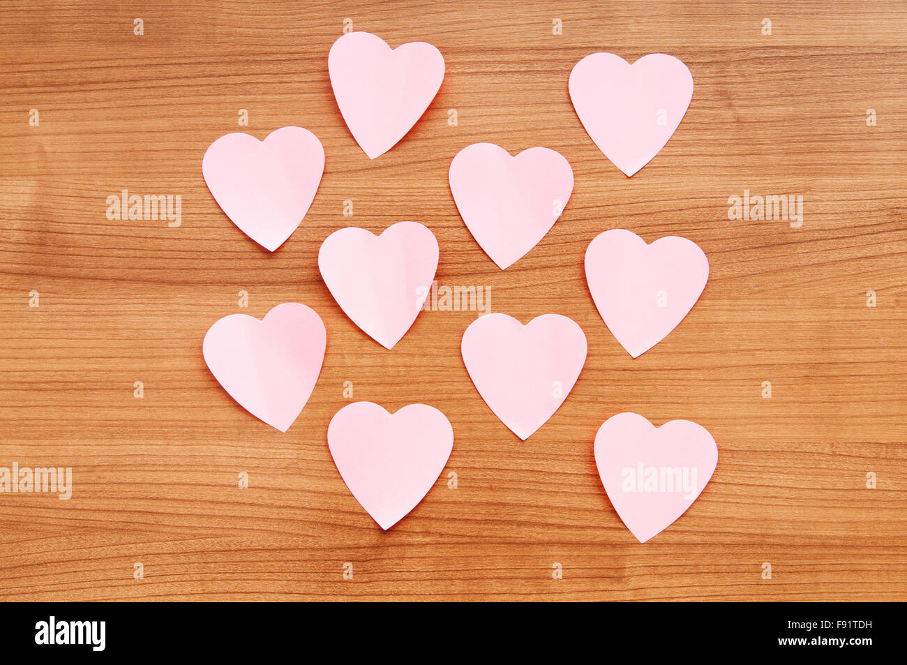 Heart shaped sticky notes on the background Stock Photo - Alamy
