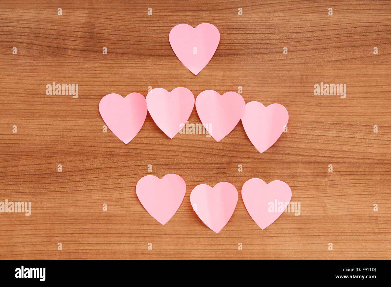Heart shaped sticky notes on the background Stock Photo - Alamy