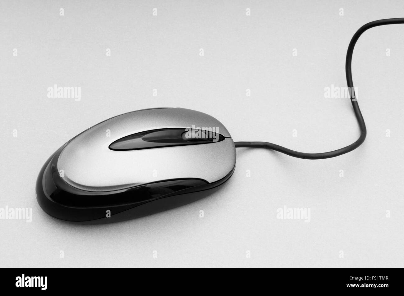 Computer mouse on the background - Technology concept Stock Photo - Alamy