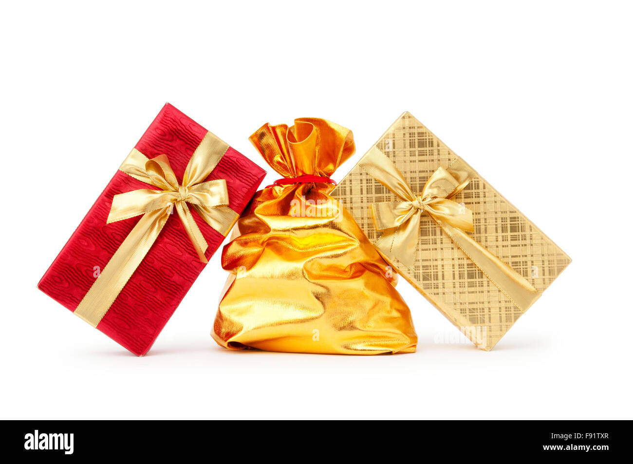 Gift boxes and golden sacks Stock Photo - Alamy