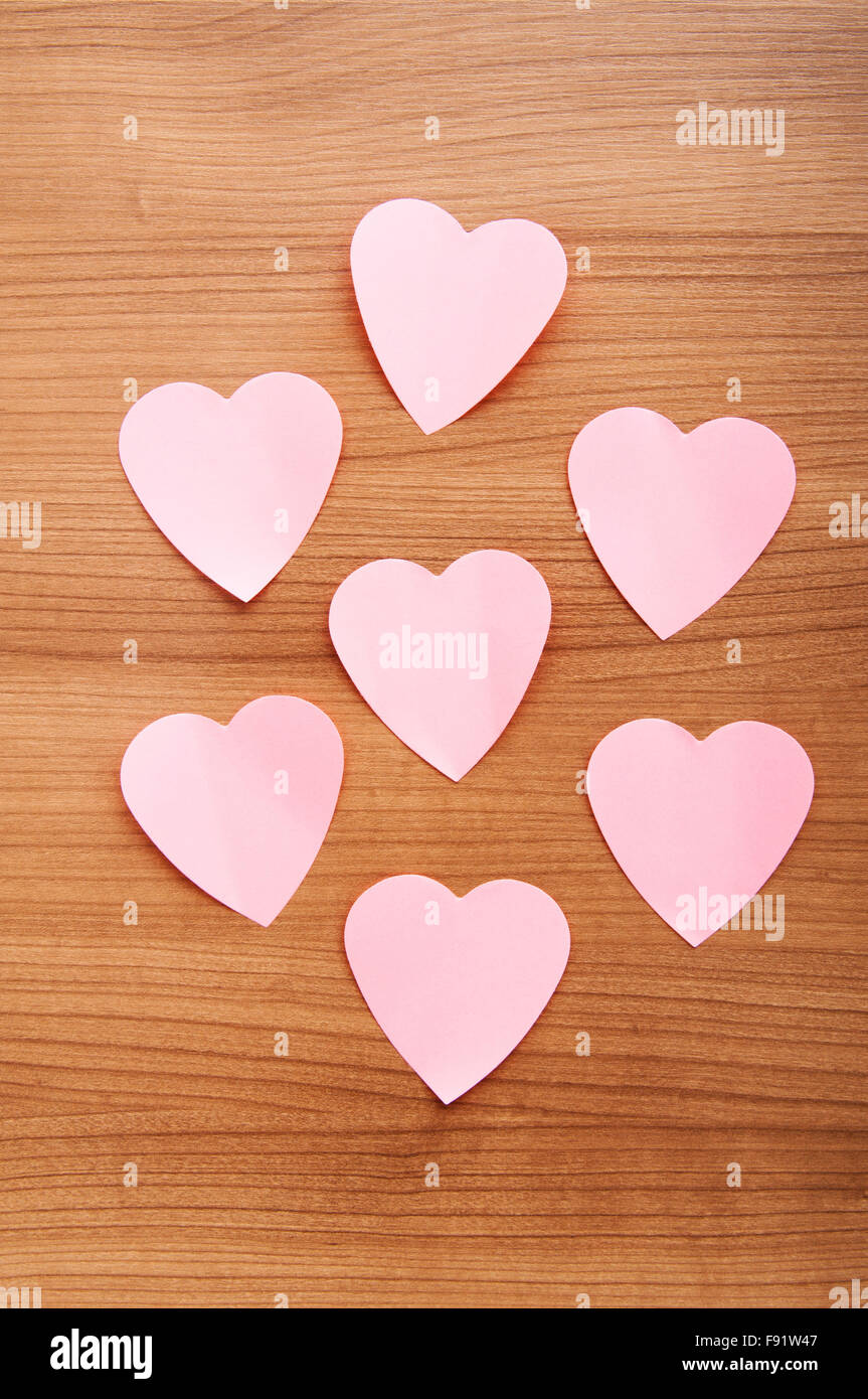 Heart shaped sticky notes on the background Stock Photo - Alamy