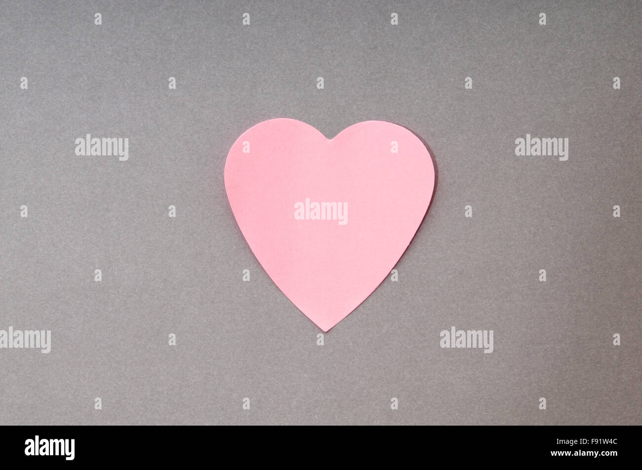 Heart shaped sticky notes on the background Stock Photo - Alamy