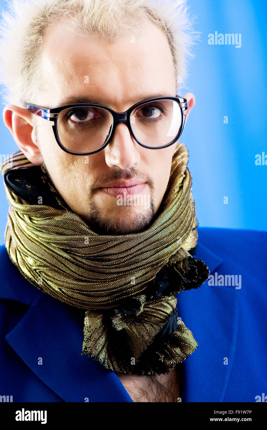 Man with blue jacket in studio shooting Stock Photo - Alamy