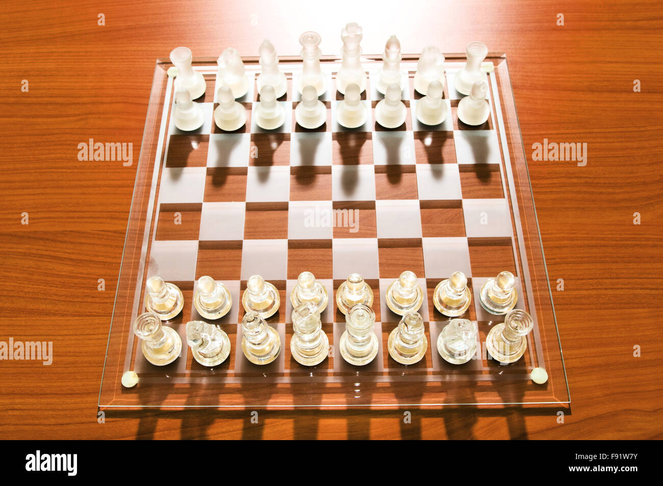 Set of chess figures on the playing board Stock Photo - Alamy