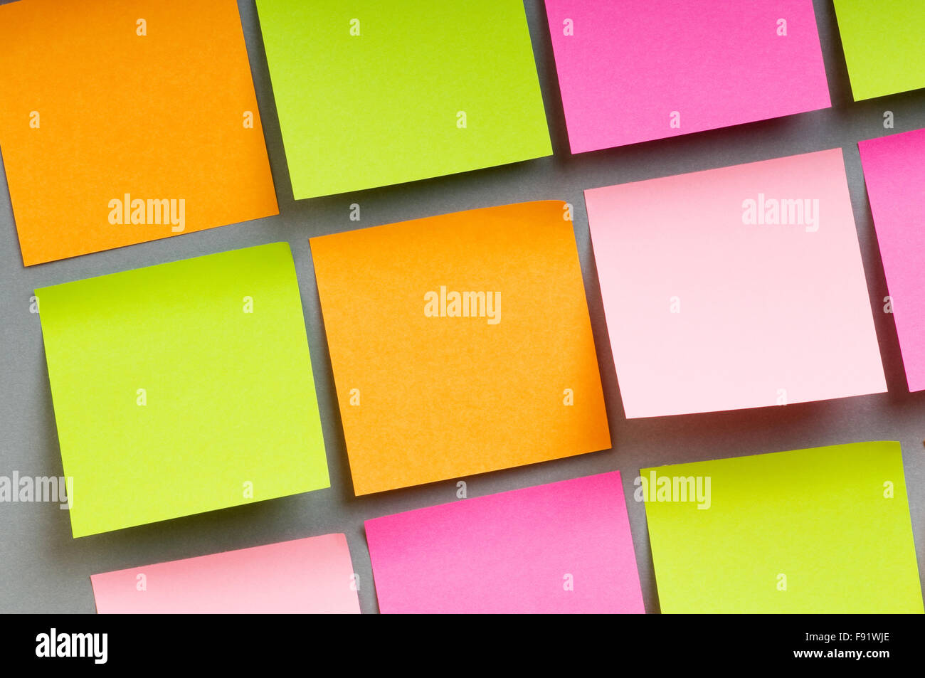 Reminder notes on the bright colorful paper Stock Photo - Alamy