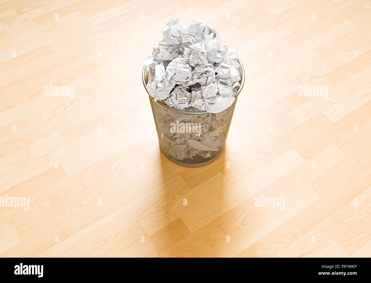 Garbage bin with paper waste isolated on white Stock Photo - Alamy