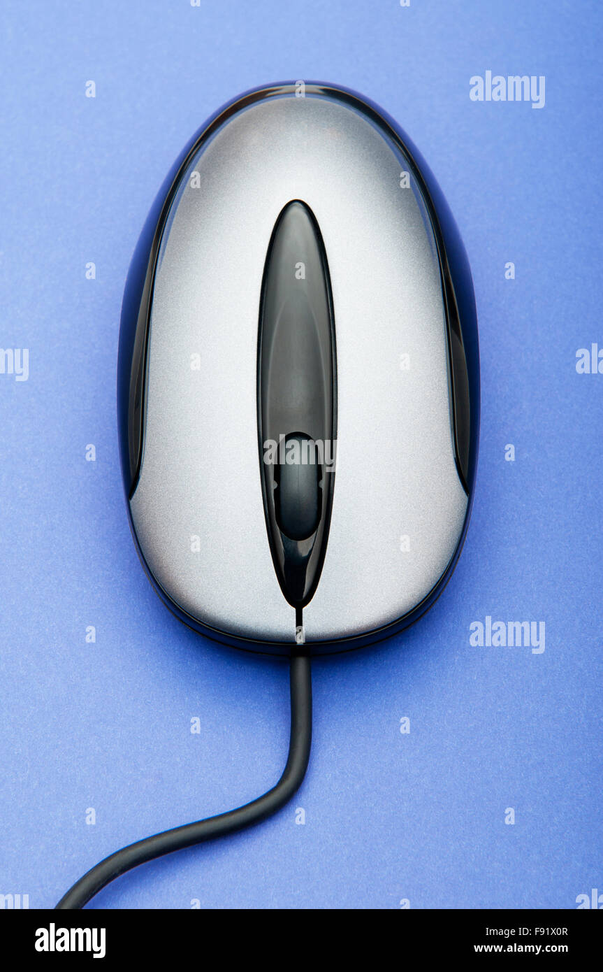 Computer mouse on the background - Technology concept Stock Photo - Alamy