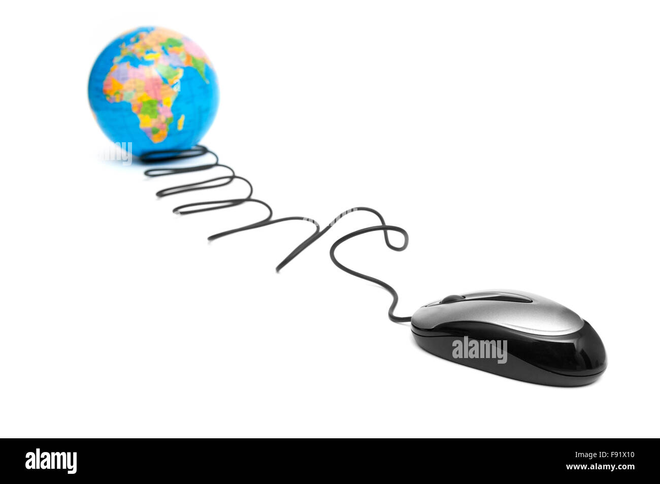 Computer mouse and globe - ruling the world Stock Photo - Alamy