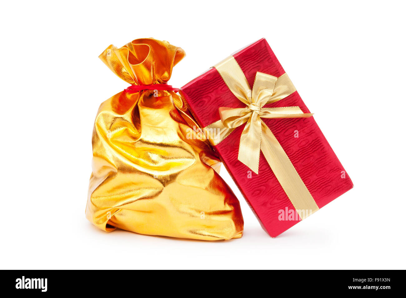 Gift boxes and golden sacks Stock Photo - Alamy