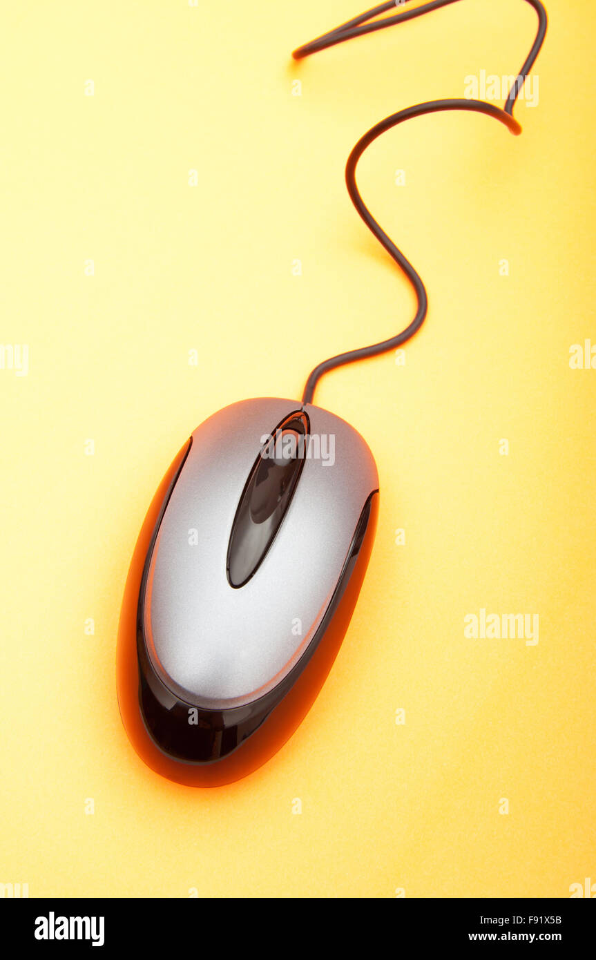 Computer mouse on the background - Technology concept Stock Photo - Alamy