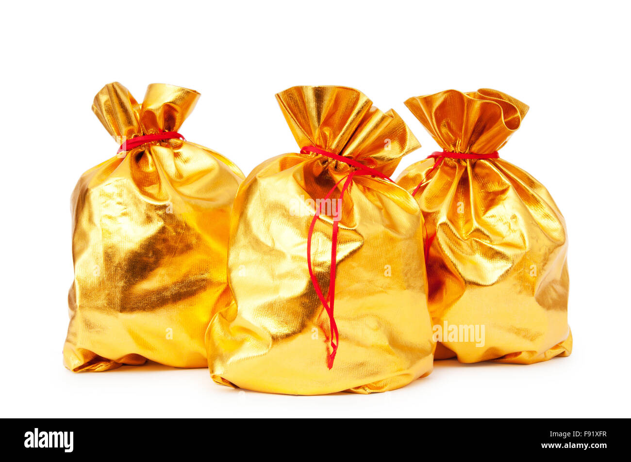 Golden sacks full of something good Stock Photo - Alamy