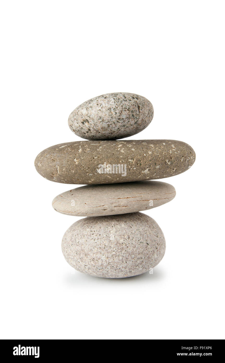 Stack of pebbles isolated on the white Stock Photo - Alamy
