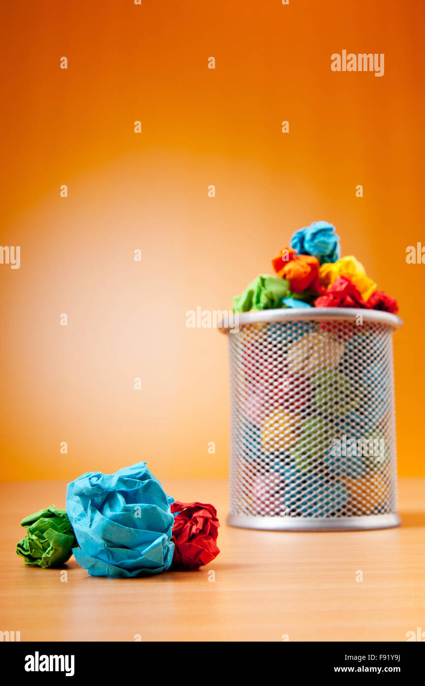 Garbage bin with paper waste isolated on white Stock Photo - Alamy