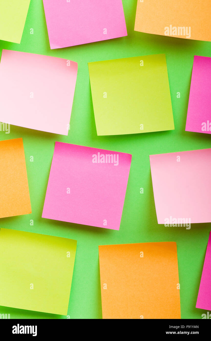 Reminder notes on the bright colorful paper Stock Photo - Alamy