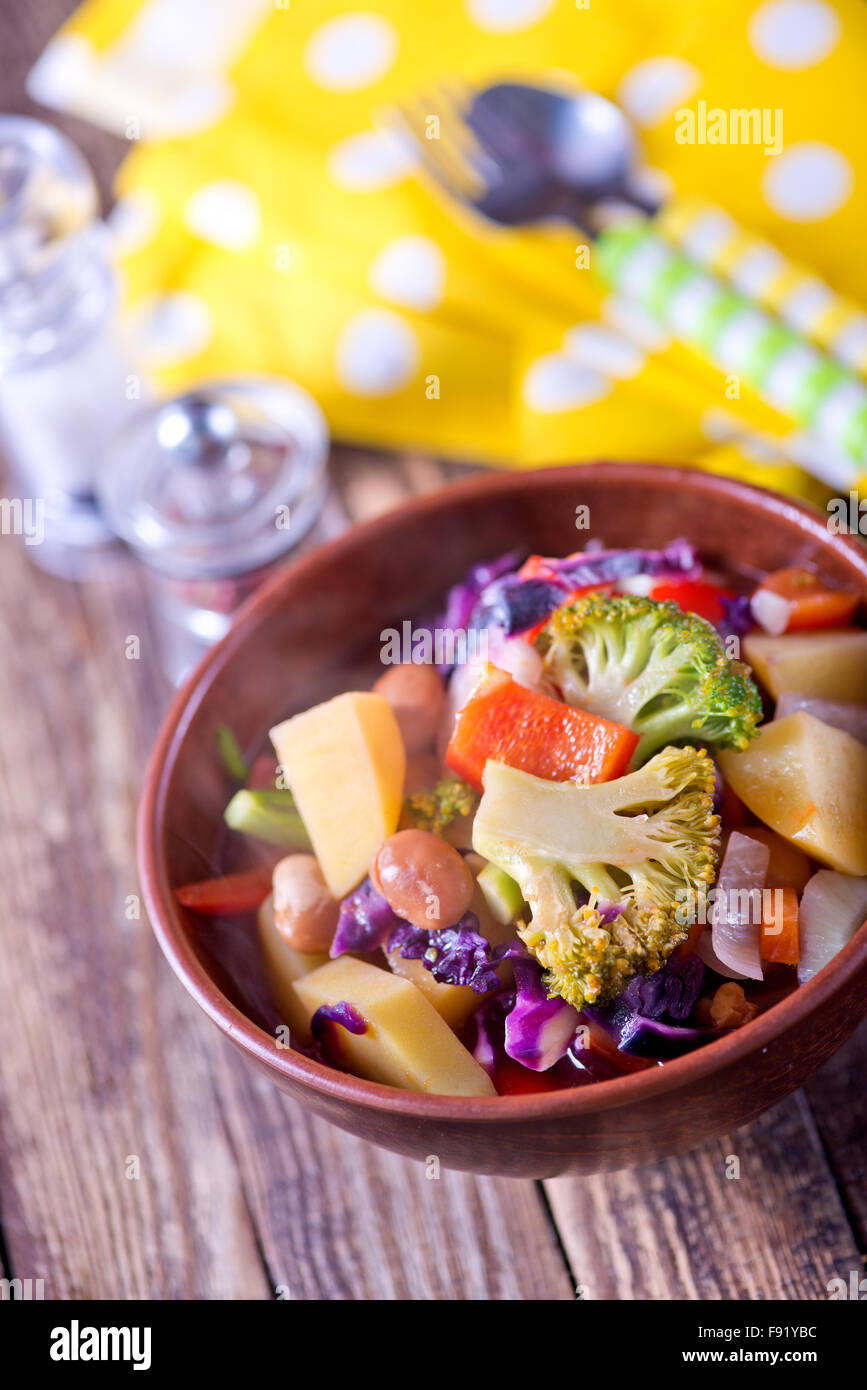fresh lunch on the wooden kitchen table Stock Photo - Alamy