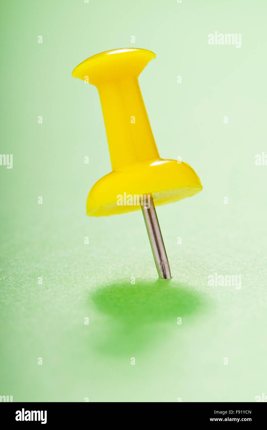 Office pins on the paper Stock Photo - Alamy