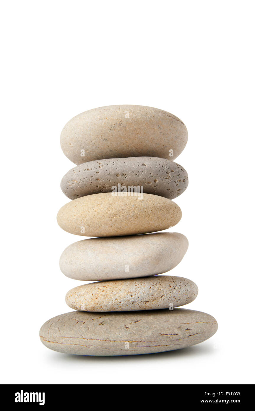 Stack of pebbles isolated on the white Stock Photo - Alamy