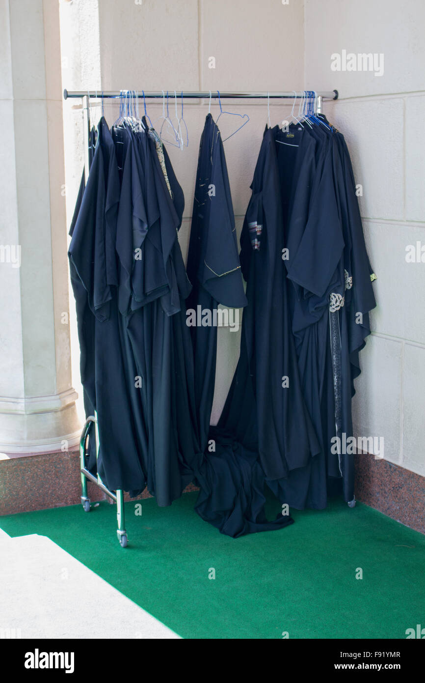 Clothing to wear for tourists that visit the Mosque Stock Photo - Alamy