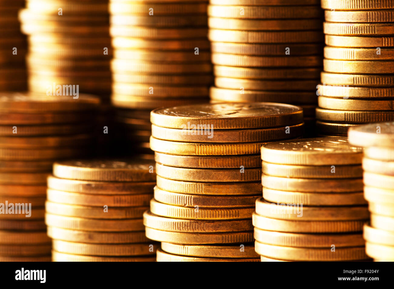 Close up of the golden coin stacks Stock Photo - Alamy