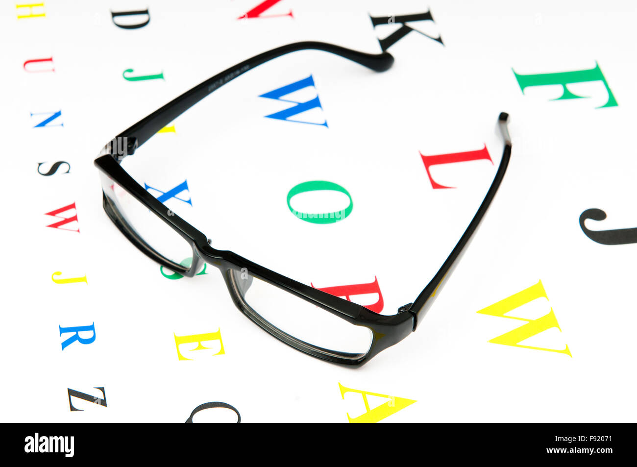 Optical reading glasses on the eyesight table Stock Photo - Alamy