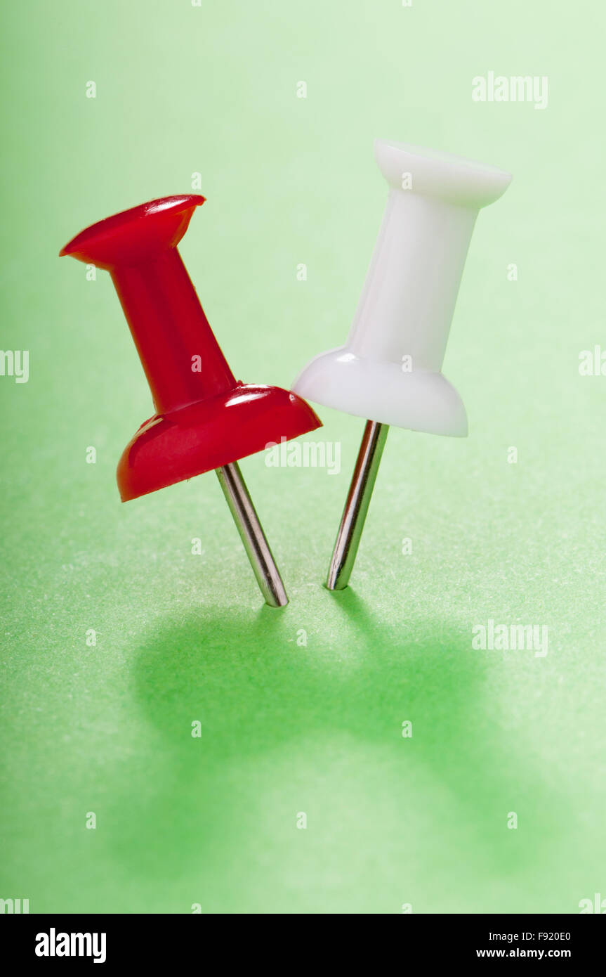 Office pins on the paper Stock Photo - Alamy