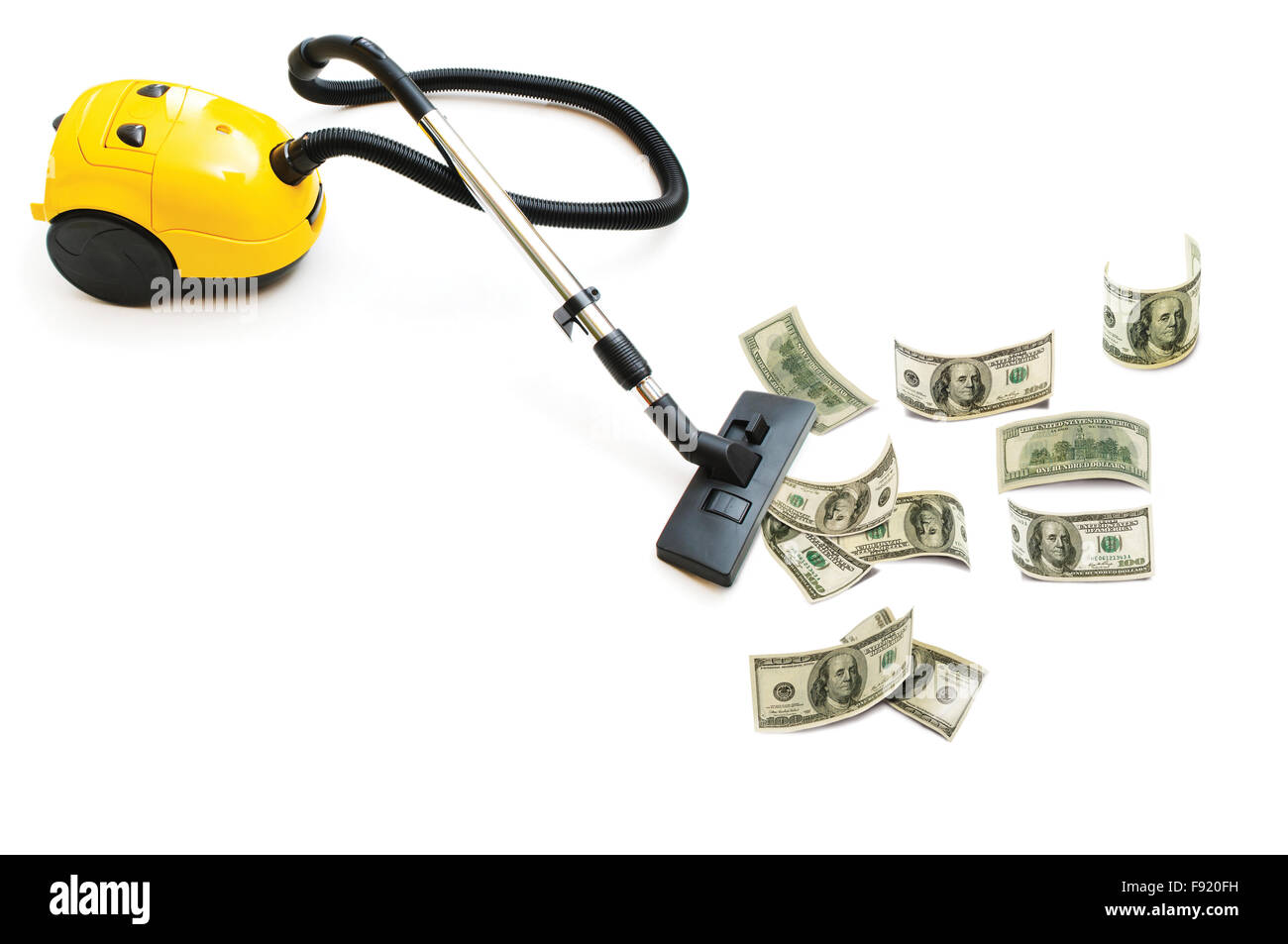 Concept with vacuum cleaner sucking money Stock Photo - Alamy