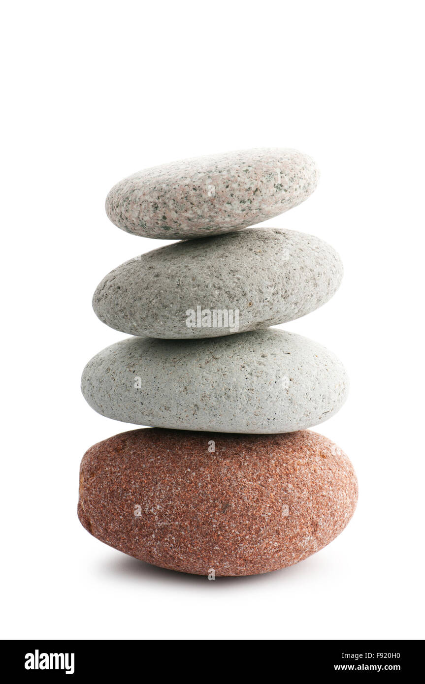 Stack of pebbles isolated on the white Stock Photo - Alamy