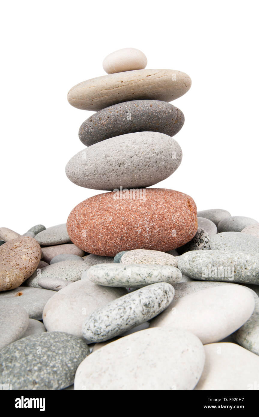 Stack of pebbles isolated on the white Stock Photo - Alamy