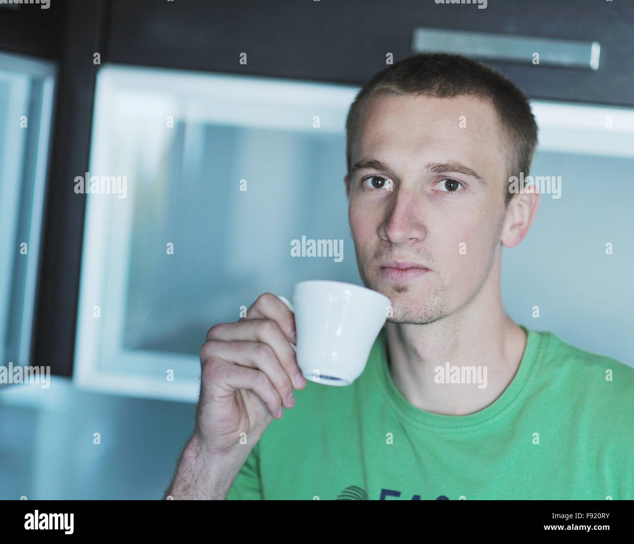handsome young man drink fresh morning coffee from white cup Stock ...