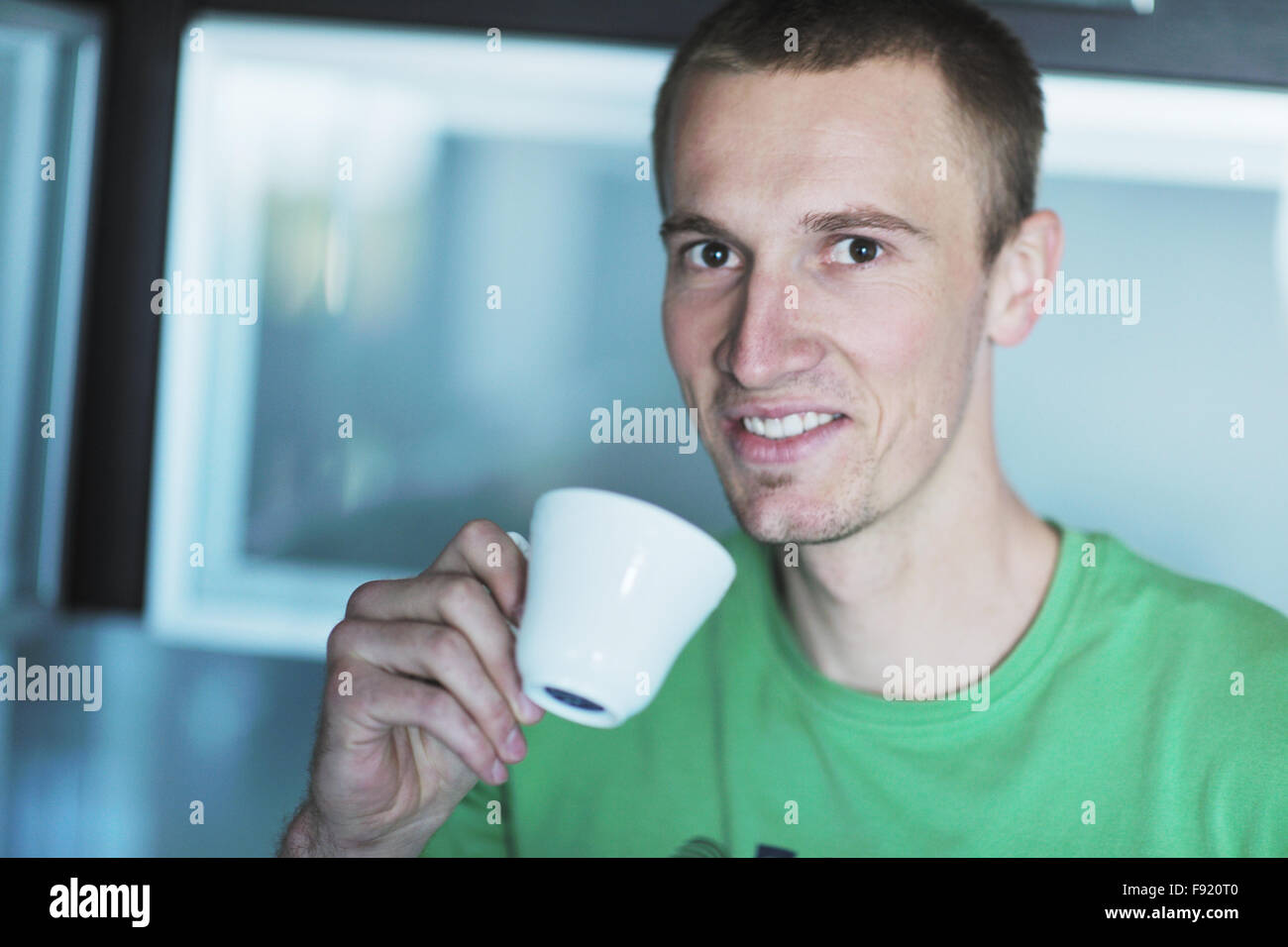 handsome young man drink fresh morning coffee from white cup Stock ...