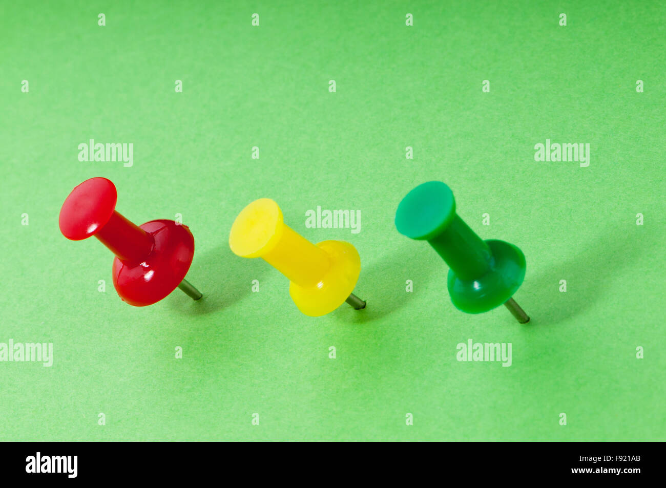 Office pins on the paper Stock Photo - Alamy