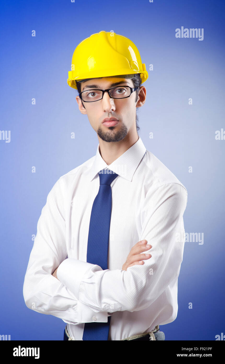 Young engineer wearing hard hat Stock Photo - Alamy