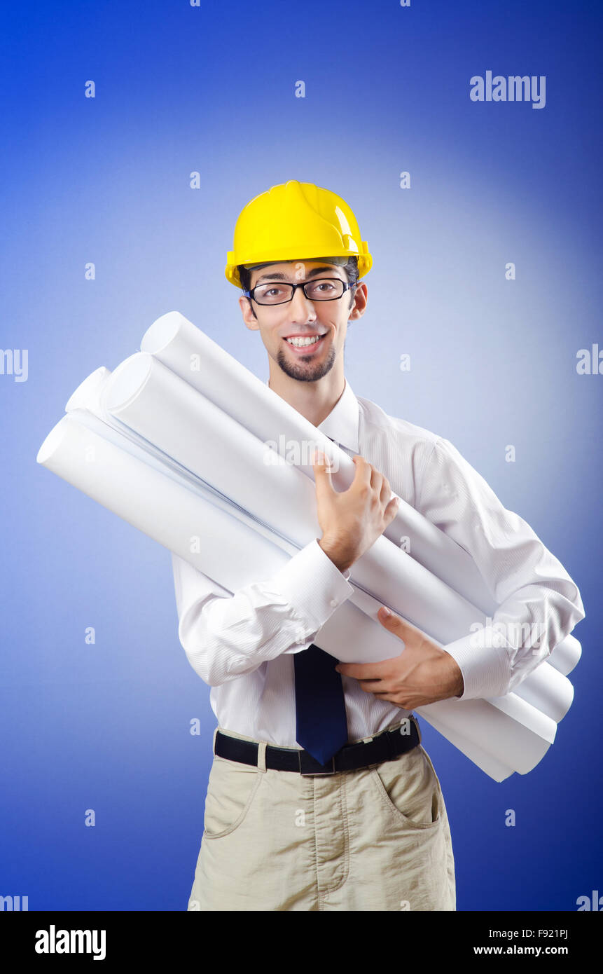 Young engineer working with drawings Stock Photo - Alamy