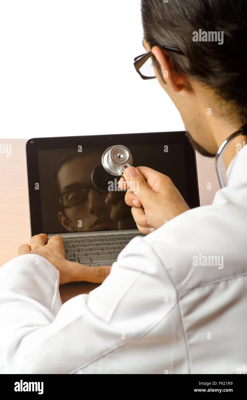 Concept of computer diagnostics on white Stock Photo - Alamy