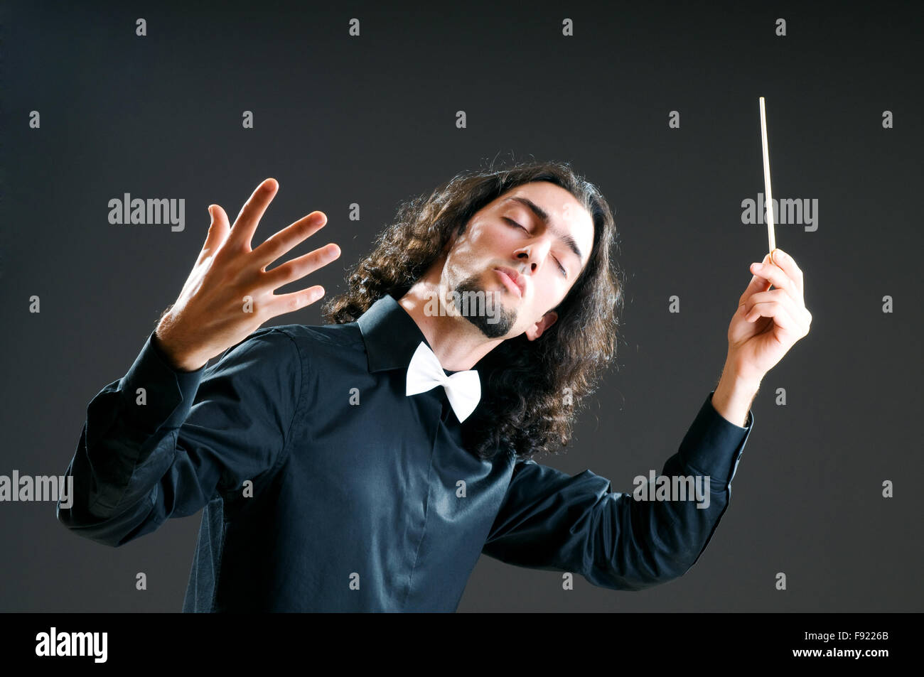 Music concept with passionate conductor Stock Photo - Alamy
