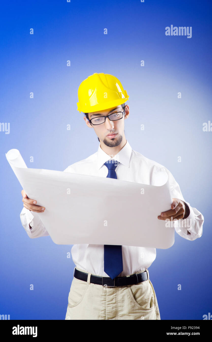 Young engineer working with drawings Stock Photo - Alamy