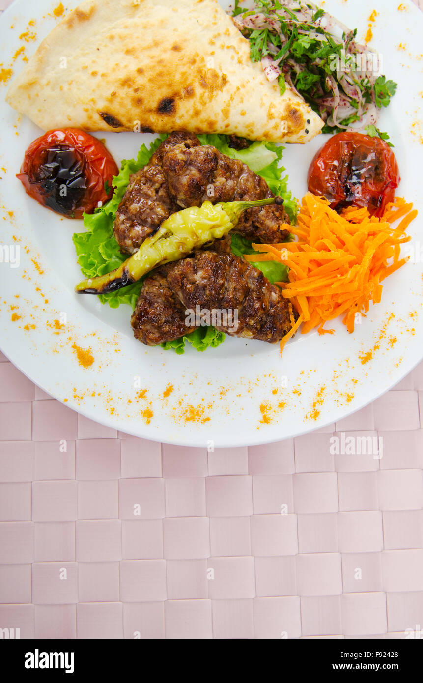 Meat cuisine - kebab served in plate Stock Photo - Alamy