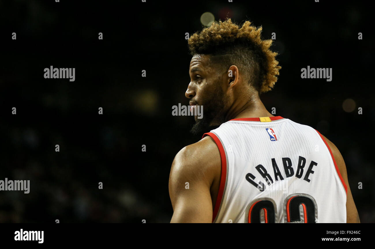 Portland, Oregon, USA. 12th December, 2015. ALLEN CRABBE (23) waits for ...