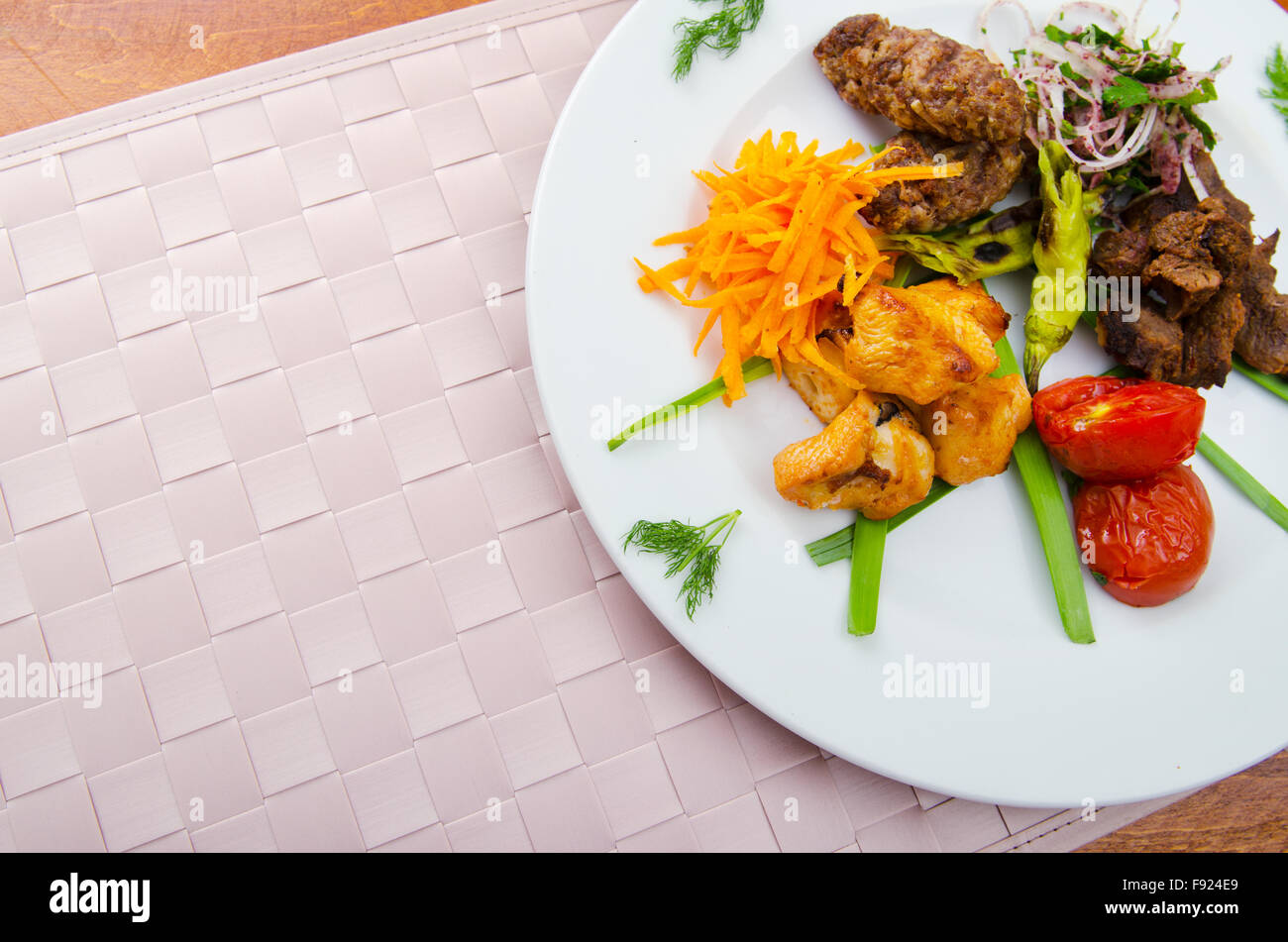 Plate with tasty lamp kebabs Stock Photo - Alamy