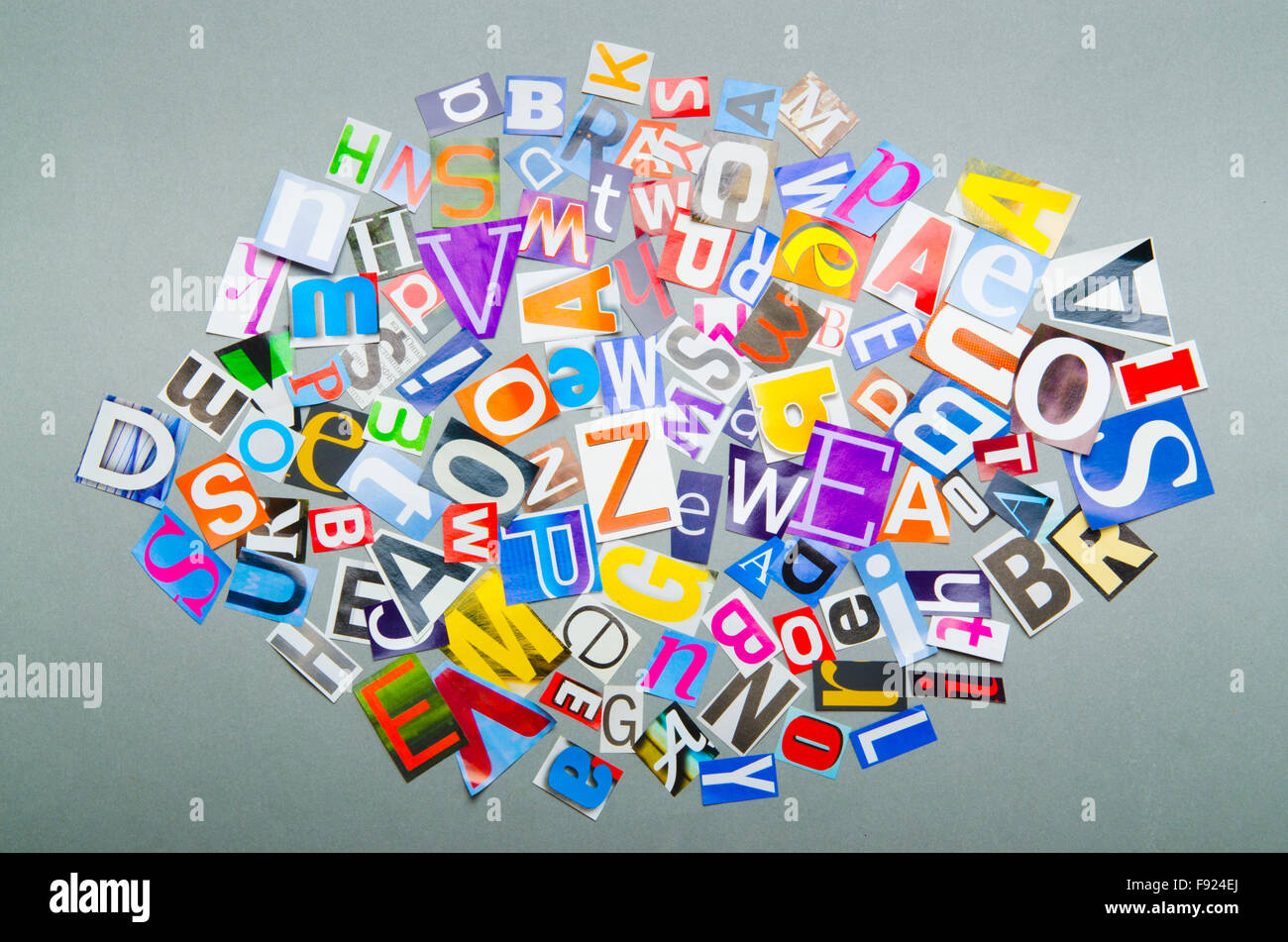 Newspaper clippings with various letters Stock Photo - Alamy