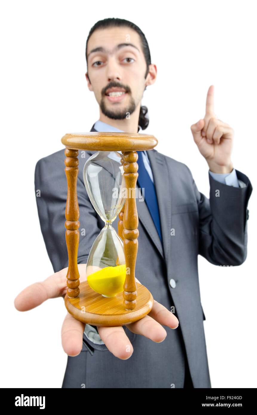 Man holding hourglass on white Stock Photo - Alamy